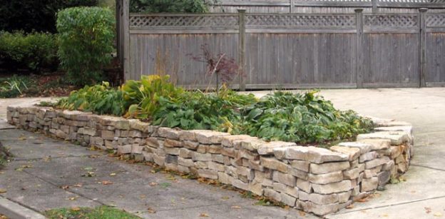 Sloped stone planting bed | Ted Chapman